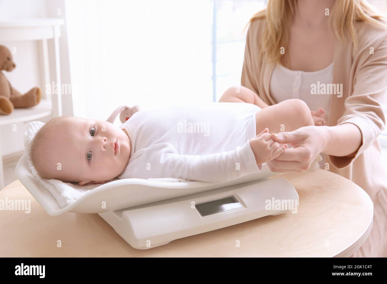 Baby Boy On Weight Scale High Resolution Stock Photography and Images ...