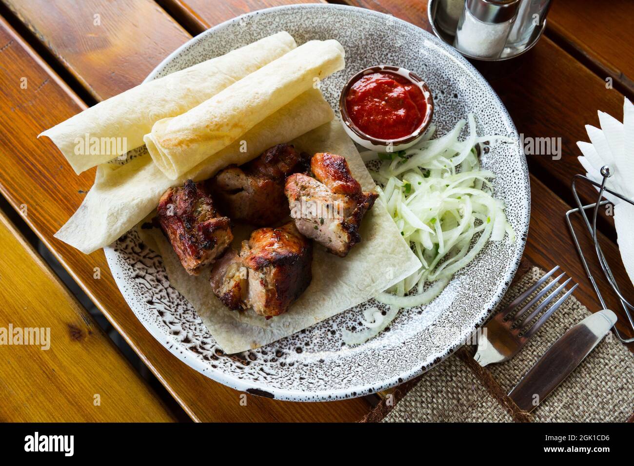 Oriental grilled pork meat shashlik Stock Photo - Alamy