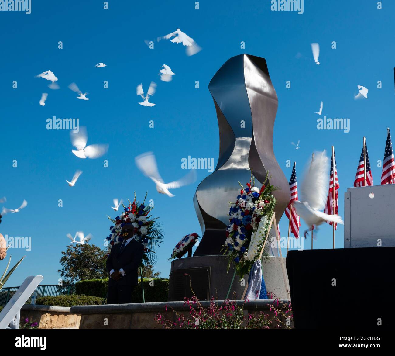 White doves flying overhead Stock Photo - Alamy