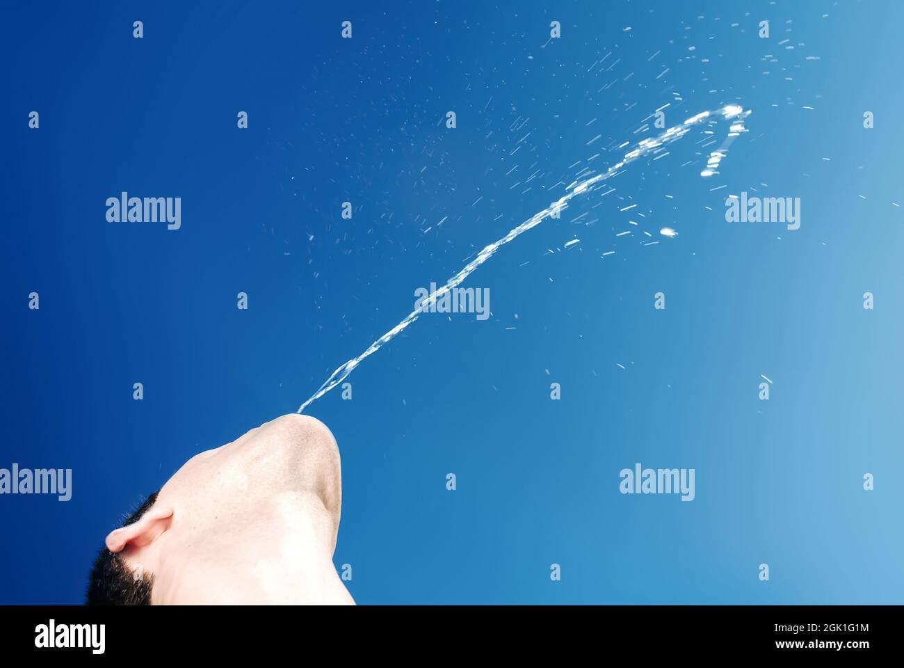 Spitting boy hi-res stock photography and images - Alamy