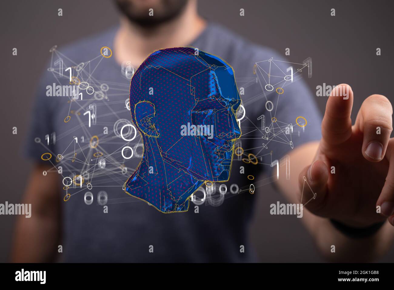 A person presenting the virtual projection of the polygonal human face ...