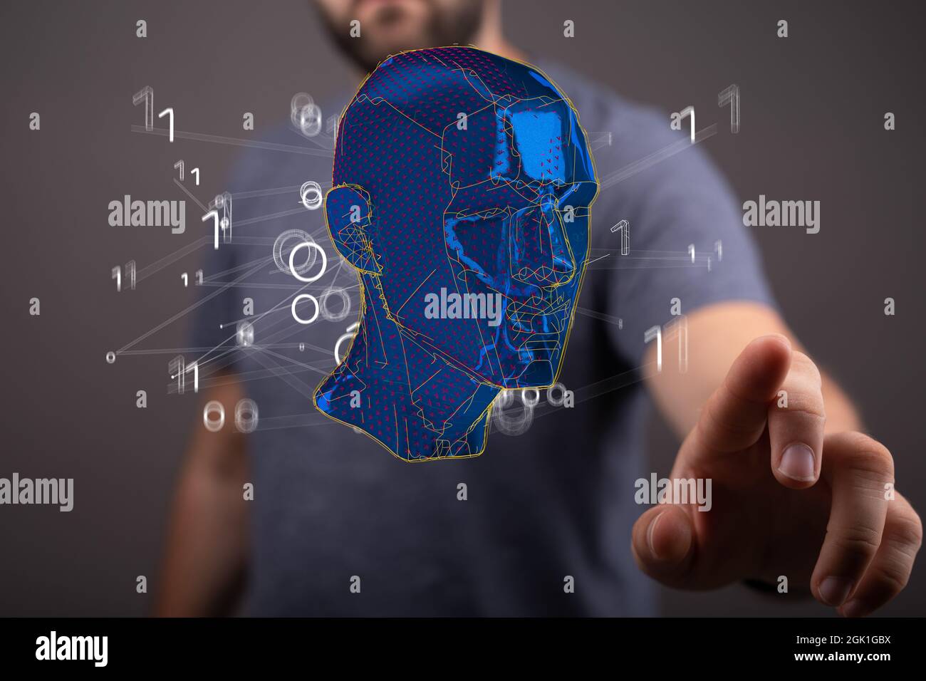 A person presenting the virtual projection of the polygonal human face ...