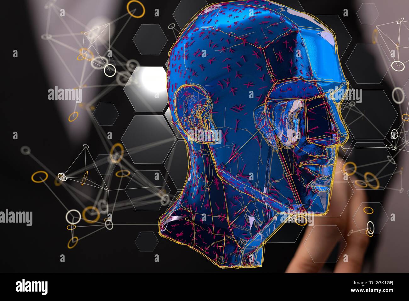 A person presenting the virtual projection of the polygonal human face ...