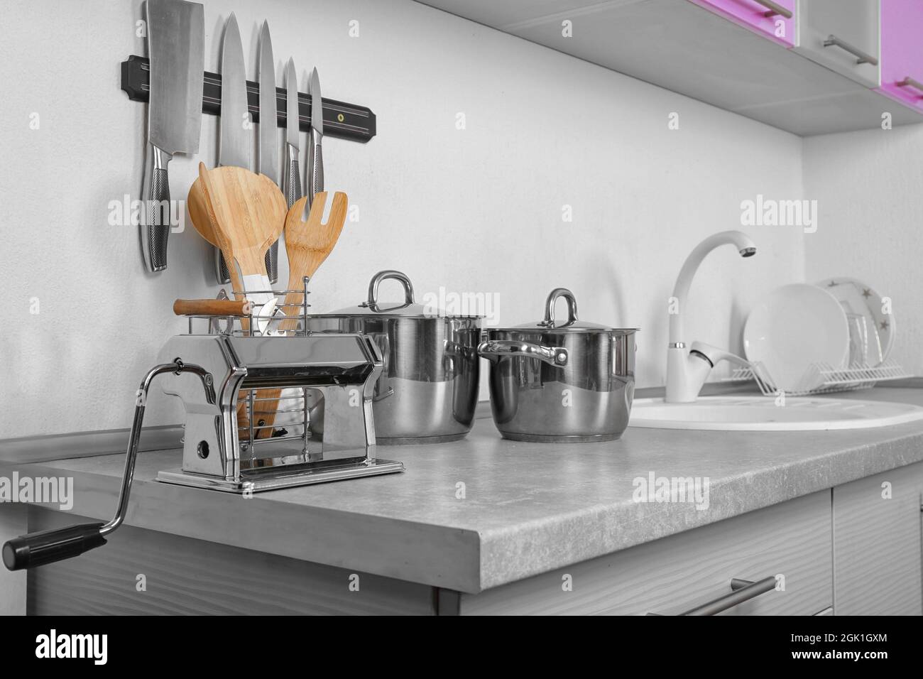 Different utensils in modern kitchen Stock Photo - Alamy