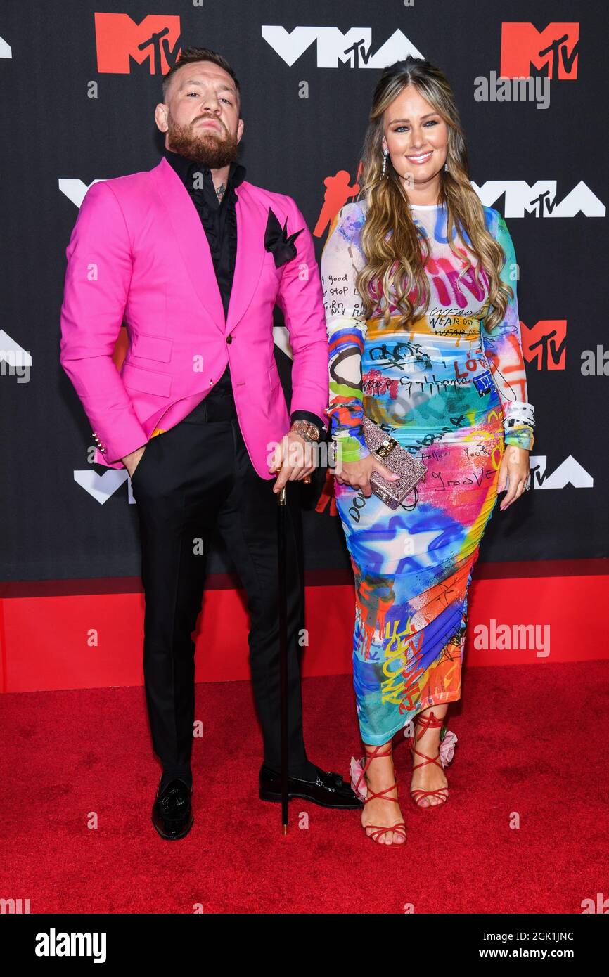 Conor McGregor and Dee Devlin walking on the red carpet at the 2021 MTV ...