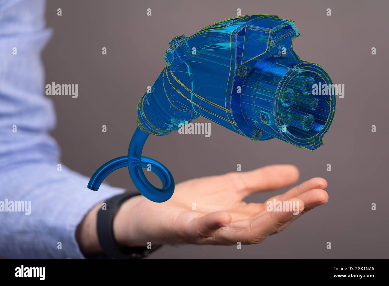 Person presenting the virtual projection of power supply for electric ...