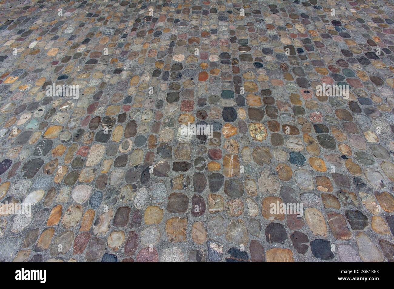 Close-up texture background view of a vintage cobblestone surface on a ...