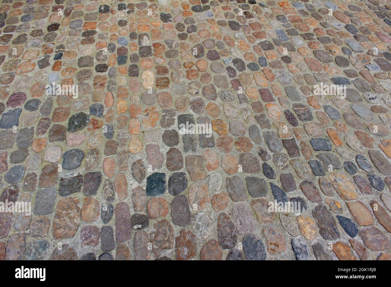 Close-up texture background view of a vintage cobblestone surface on a ...