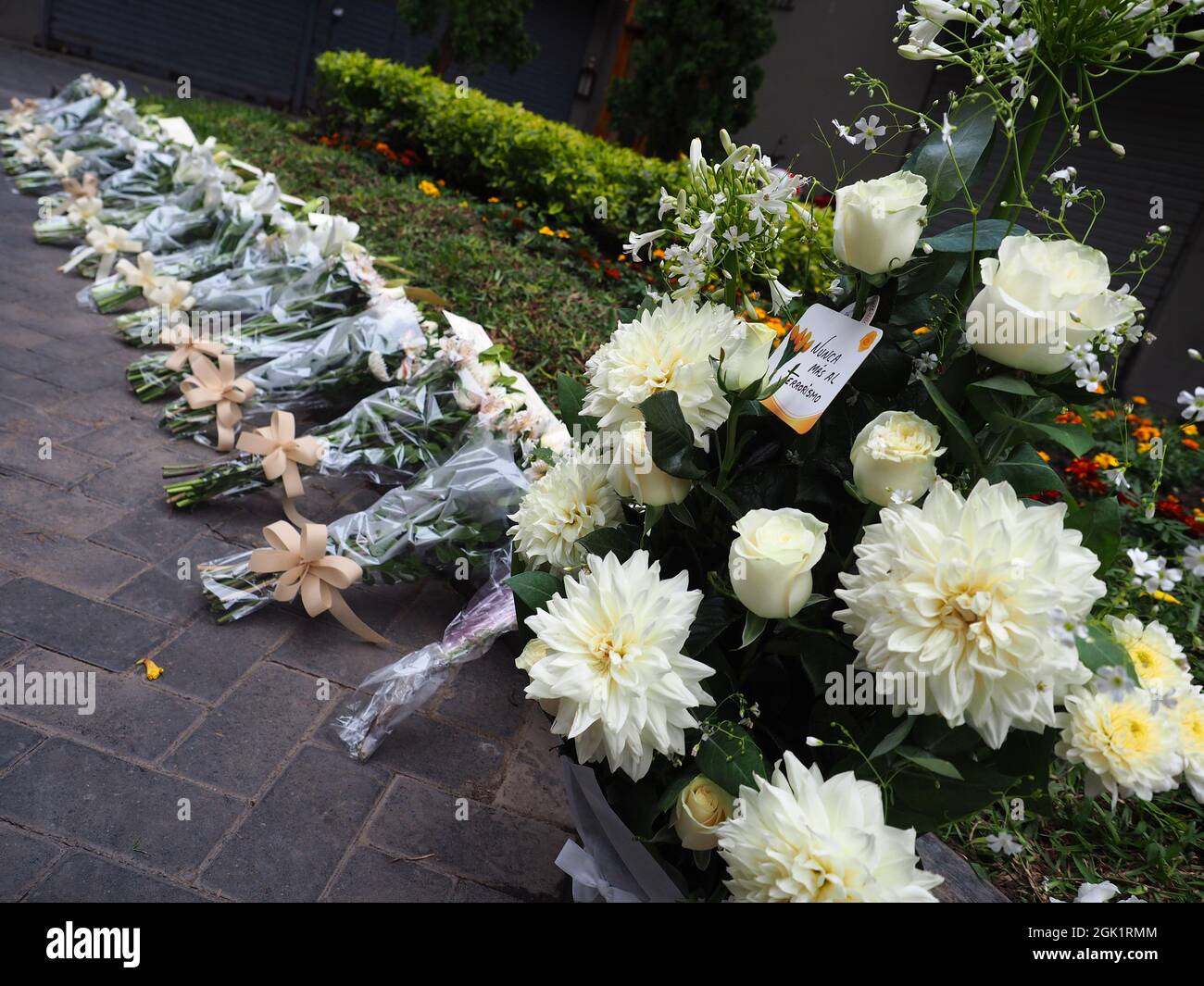 Floral offerings left at the monument to the victims of terrorism on ...