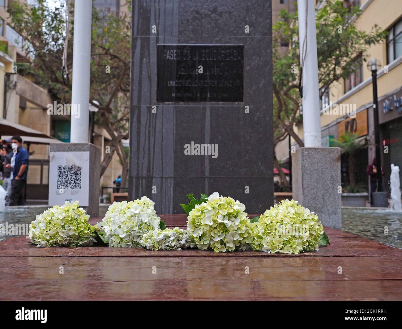 Floral offerings left at the monument to the victims of terrorism on ...
