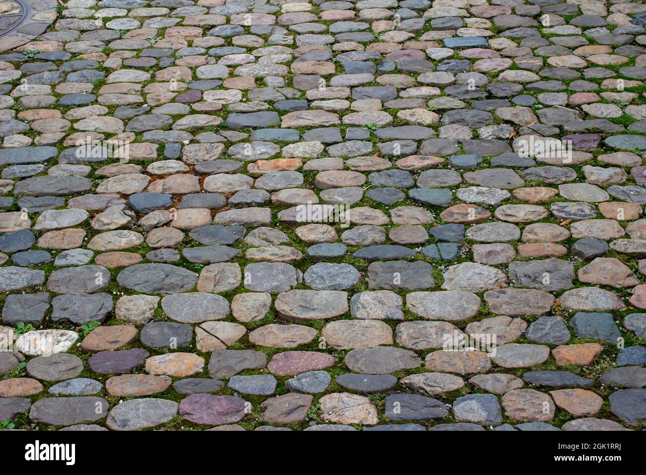 Close-up texture background view of a vintage cobblestone surface on a ...