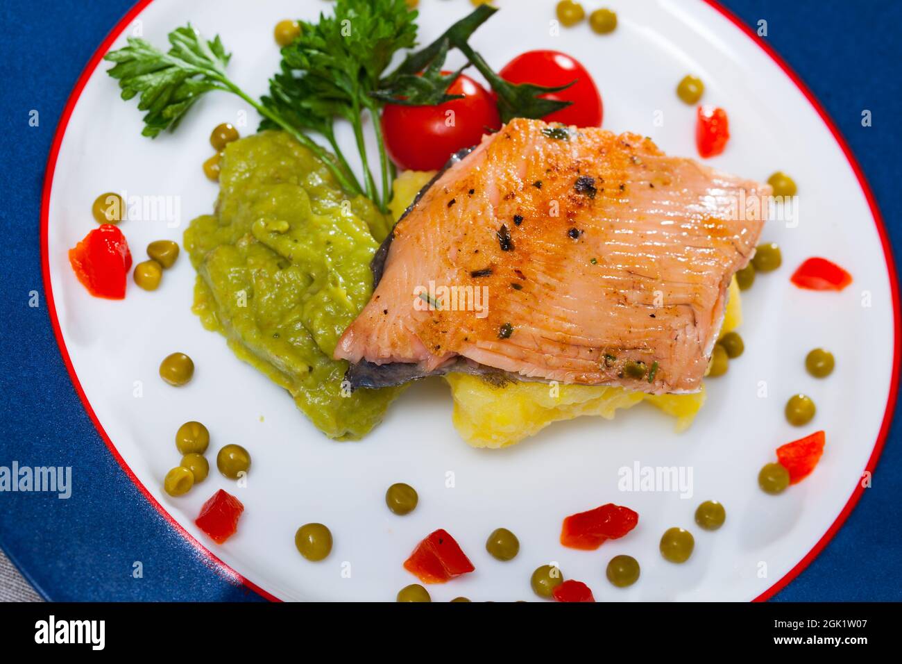 Roasted trout fillet with potato puree and guacamole Stock Photo - Alamy