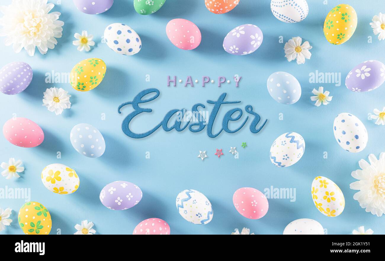 Happy easter! Colourful of Easter eggs in with flower on pastel blue ...