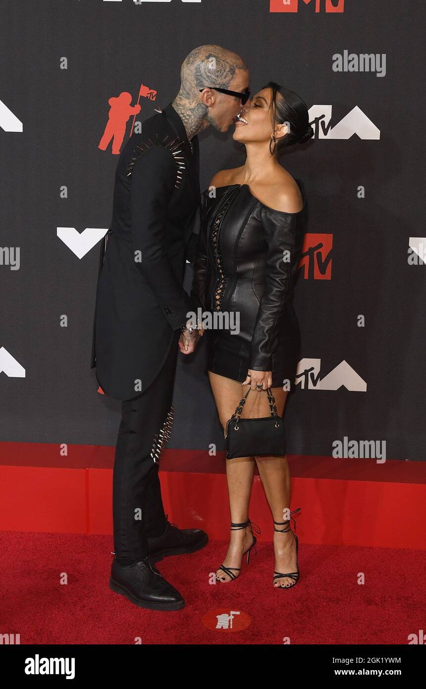 Travis Barker, Kourtney Kardashian are seen kissing on the red carper ...