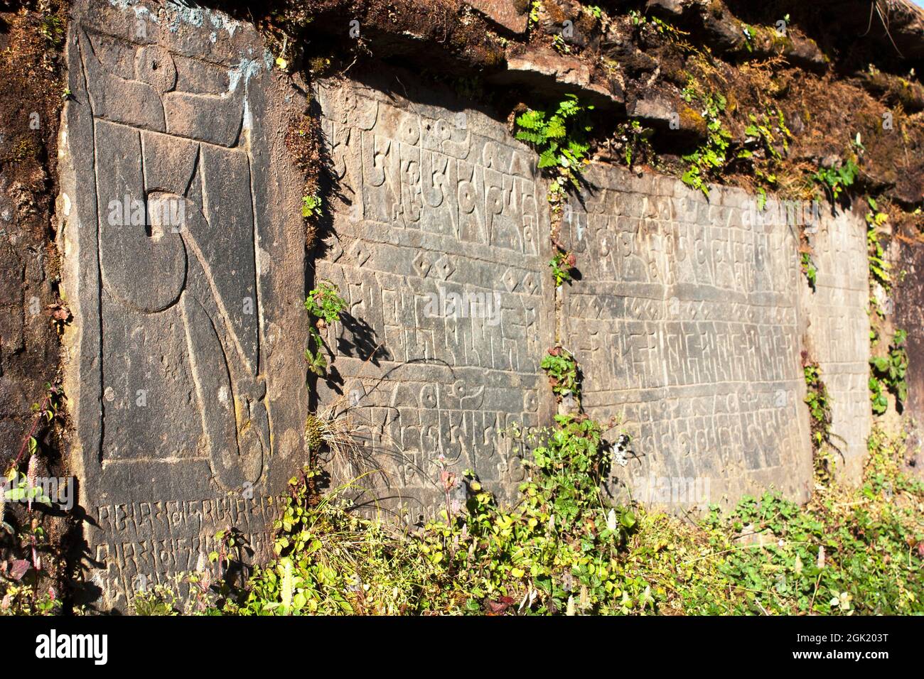 Mani wall and stones with buddhist symbols Stock Photo - Alamy