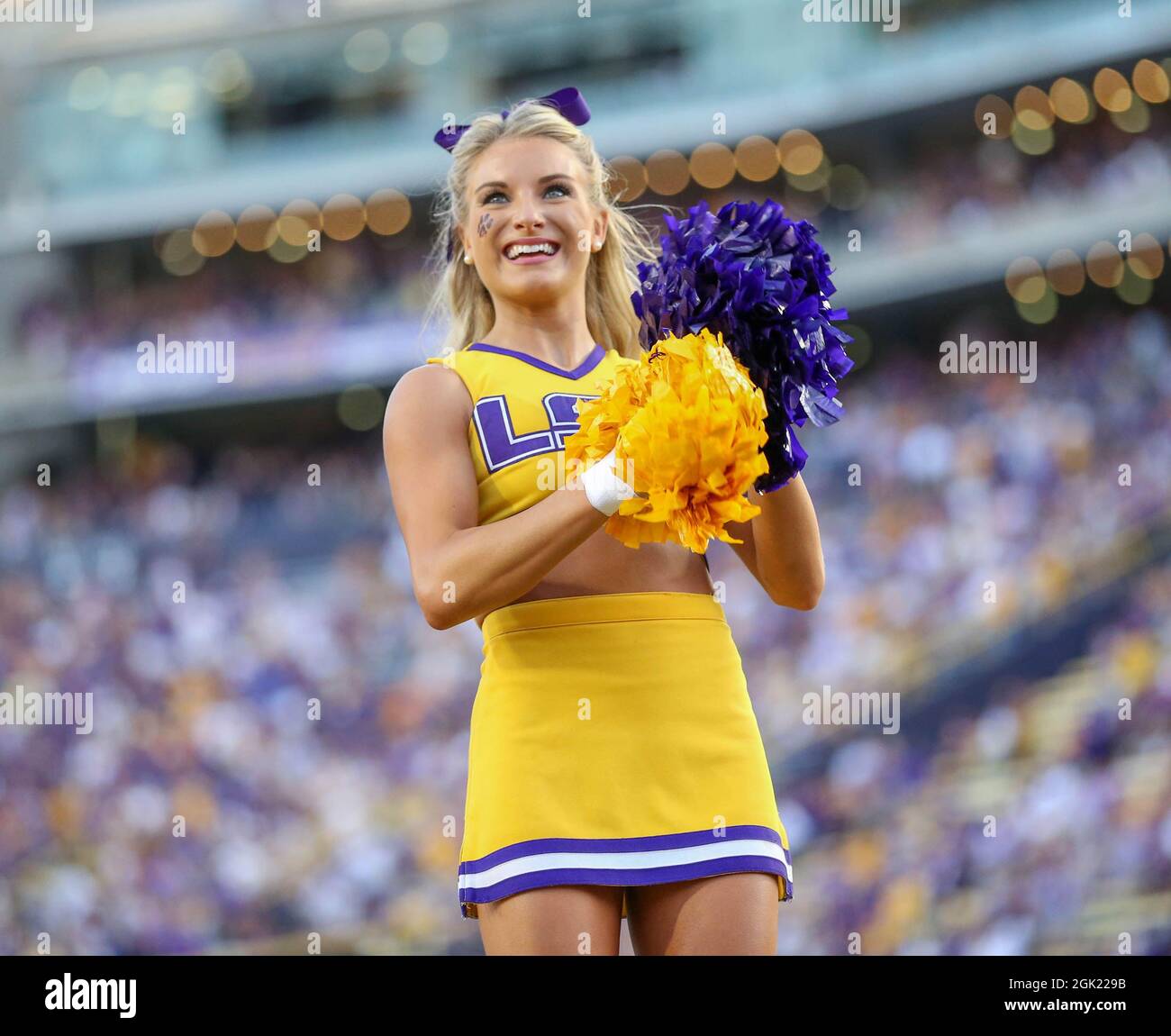 September 11, 2021: A LSU cheerleader smiles to the crowd before NCAA ...