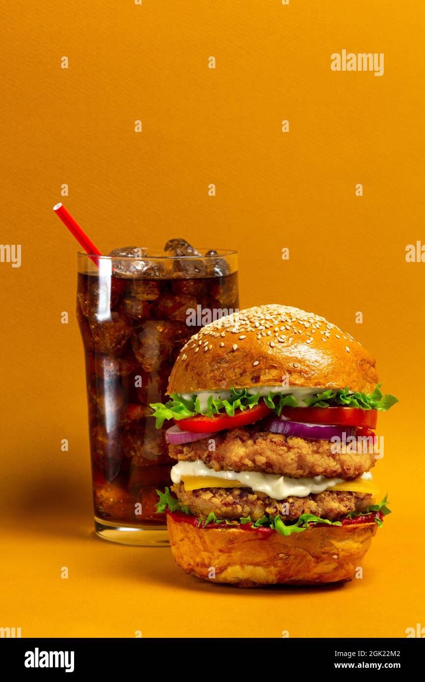 Delicious burger with cola Stock Photo - Alamy
