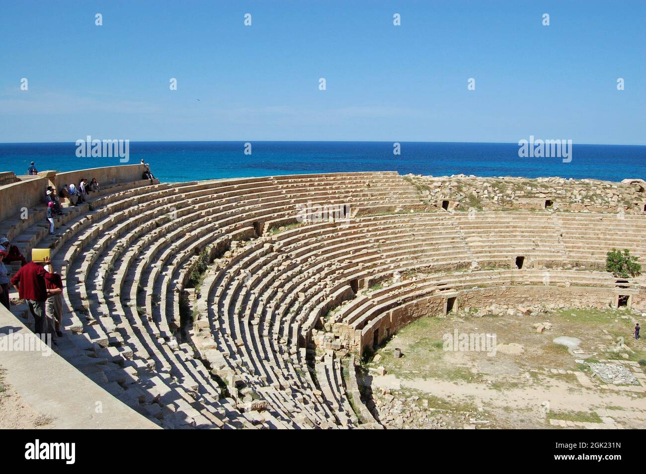 Leptis Magna, Libya - April 2, 2006: Tourists resting in the shade of ...
