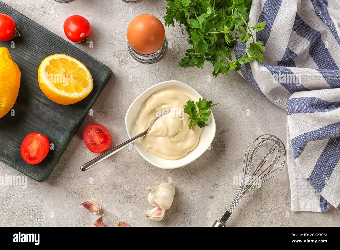Delicious mayonnaise in bowl on kitchen table, top view Stock Photo - Alamy