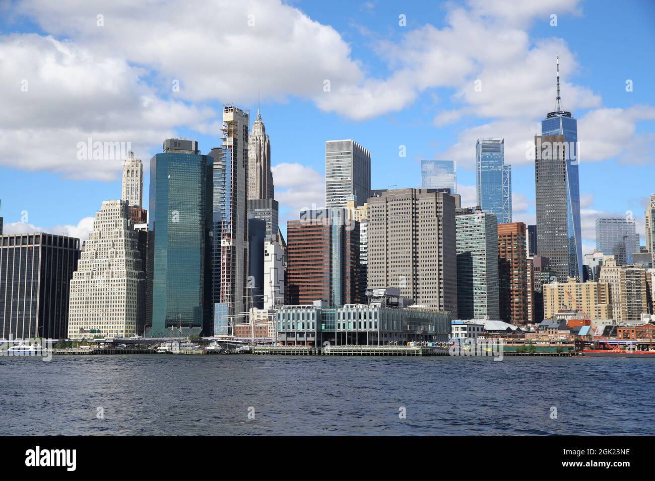 A view of the Manhattan skyline from the East River in New York City ...