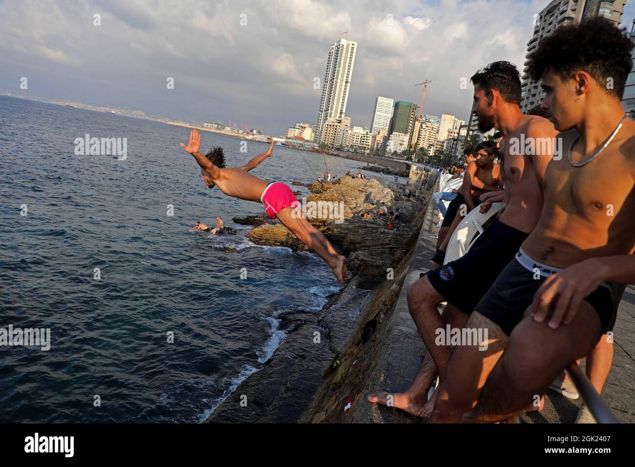 Beirut, Lebanon. 12th Sep, 2021. A young man jumps into the sea in ...