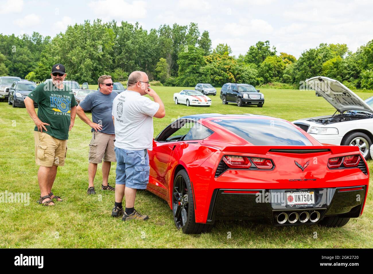 A red C7 Chevrolet Corvette sports car on display at a car show in Fort ...