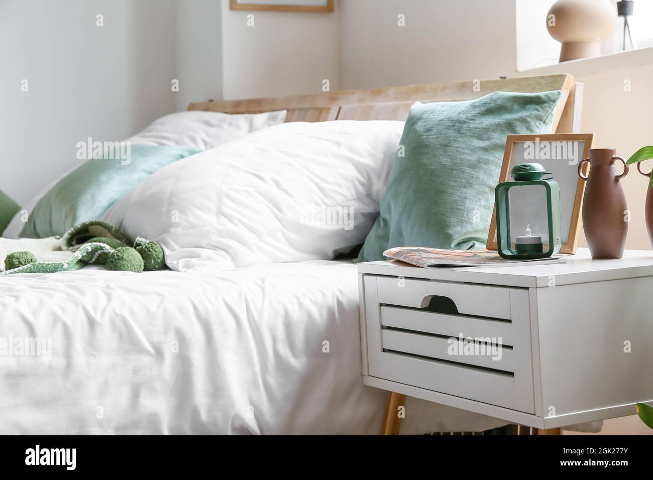 Stylish interior of modern bedroom with bedside table, closeup Stock ...