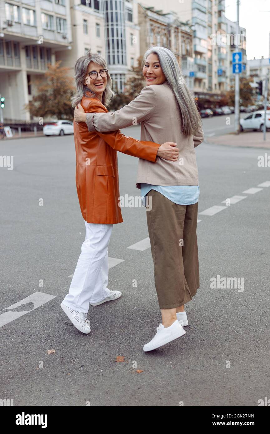 Smiling mature asian lady hi-res stock photography and images - Alamy