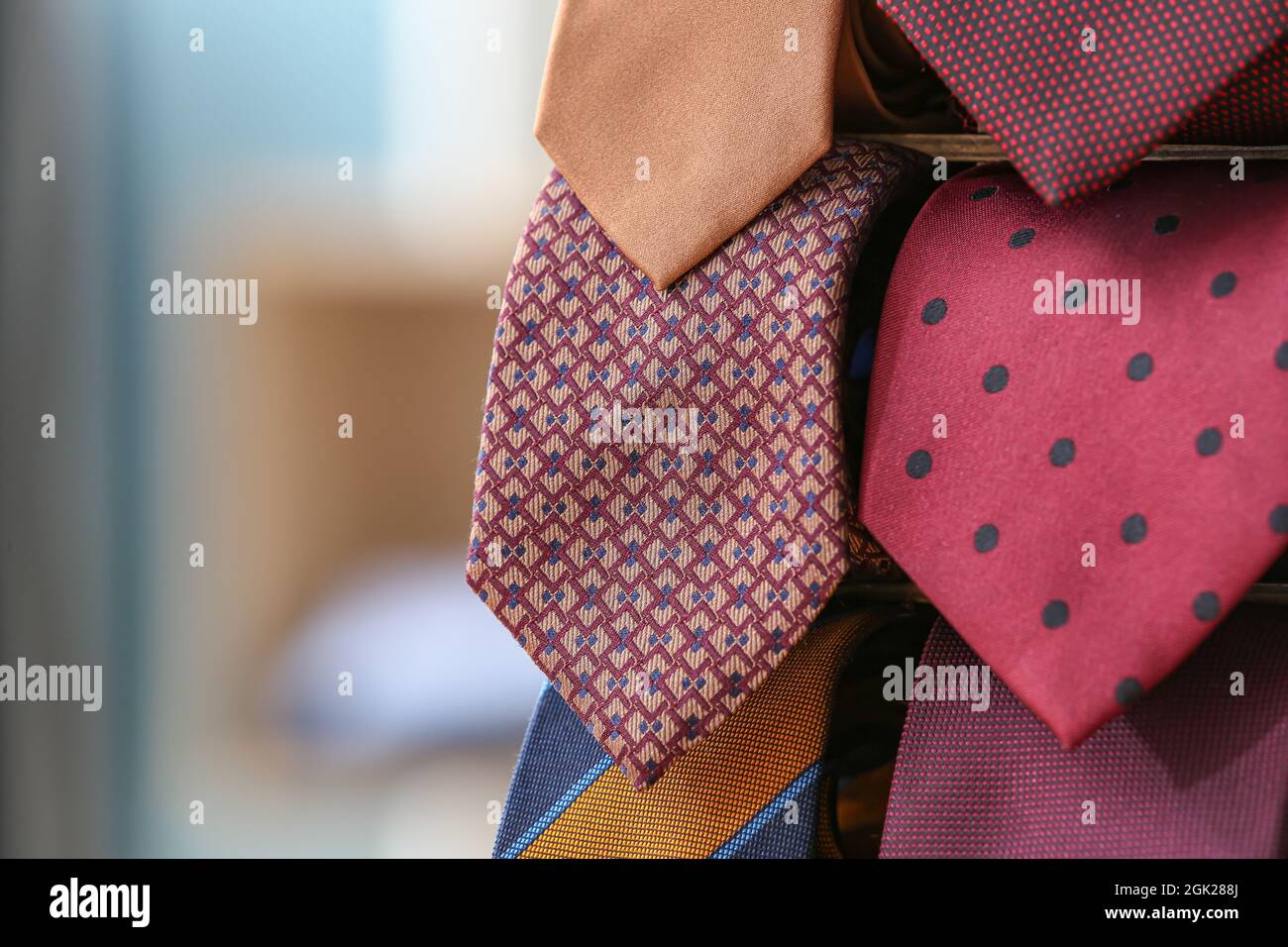 Box with many stylish neckties, closeup Stock Photo - Alamy