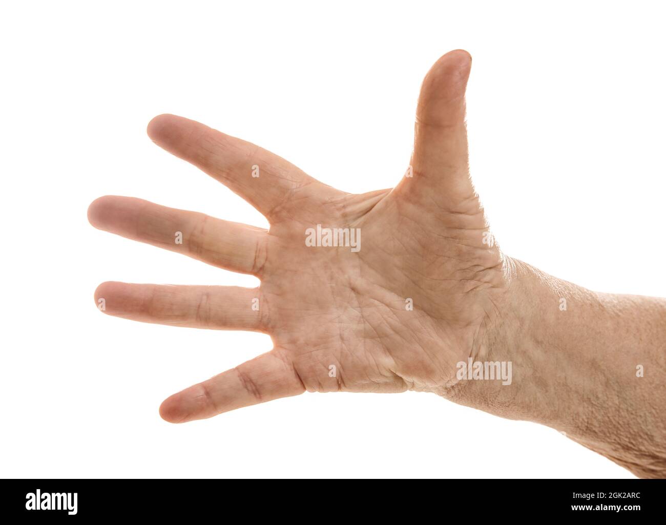 Senior woman's hand on white background Stock Photo - Alamy