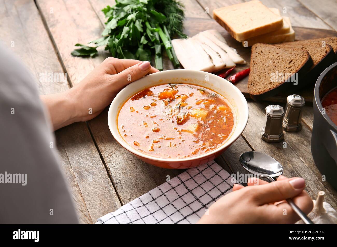 Woman eat borscht on hi-res stock photography and images - Alamy
