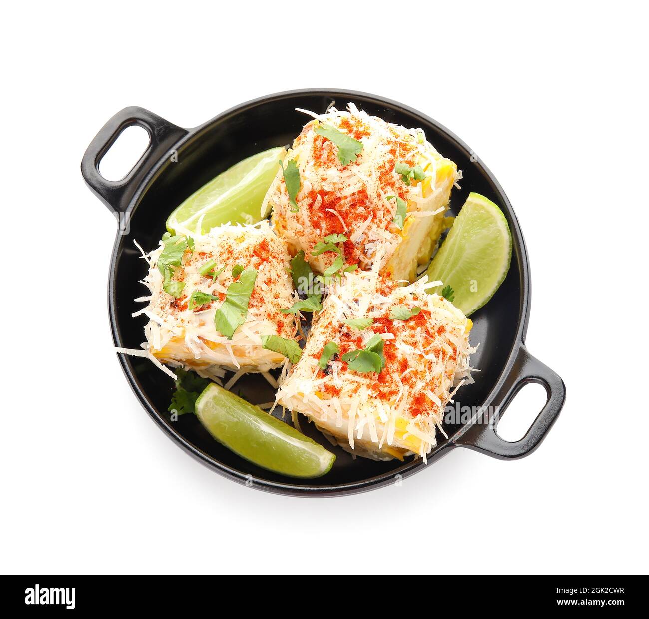 Frying pan with tasty Elote Mexican Street Corn on white background ...