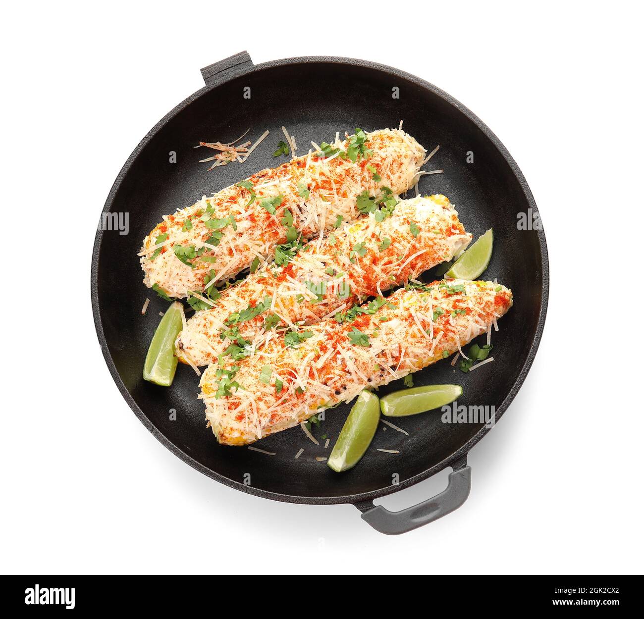 Frying pan with tasty Elote Mexican Street Corn on white background ...