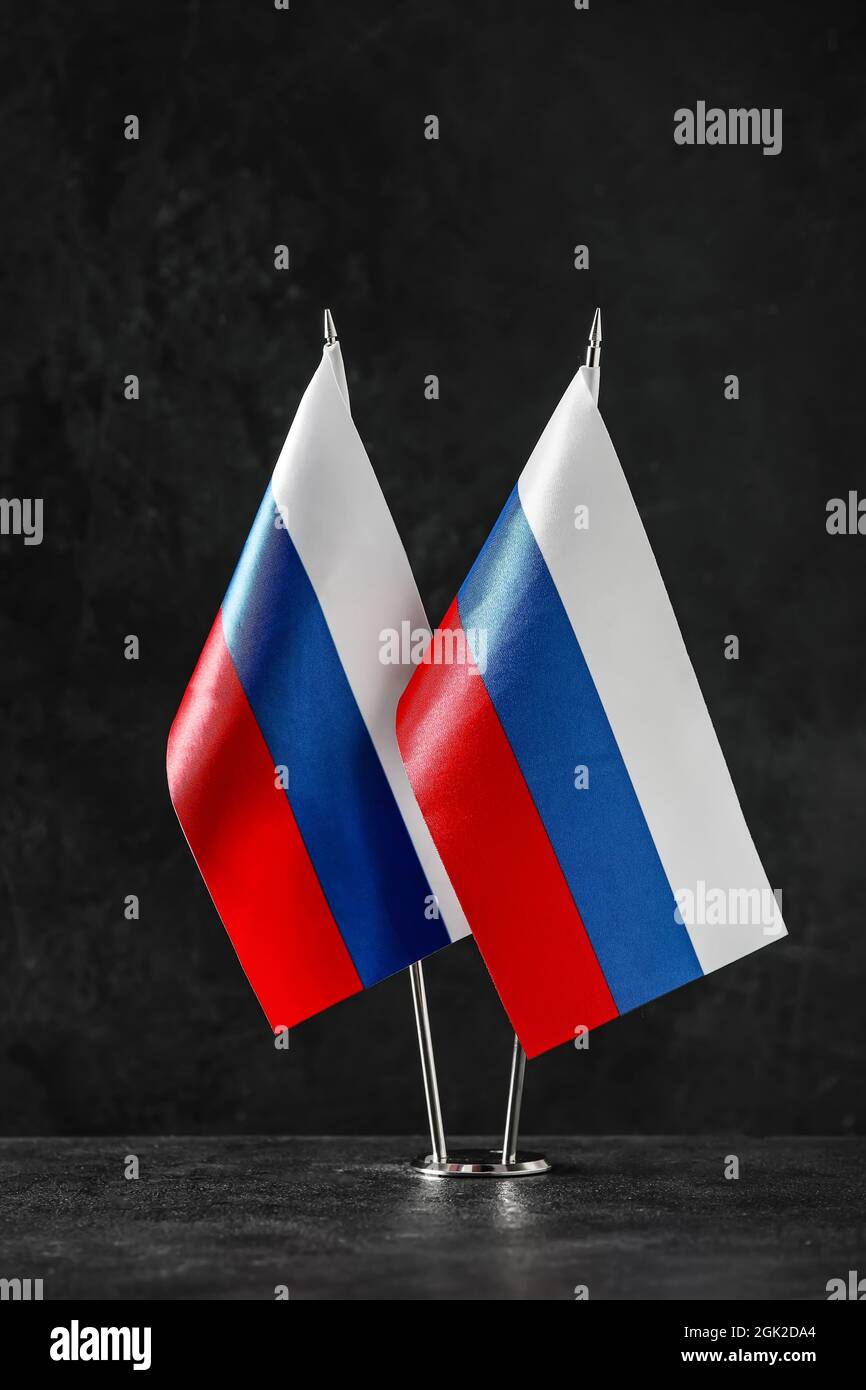 Russian flags on black background Stock Photo - Alamy