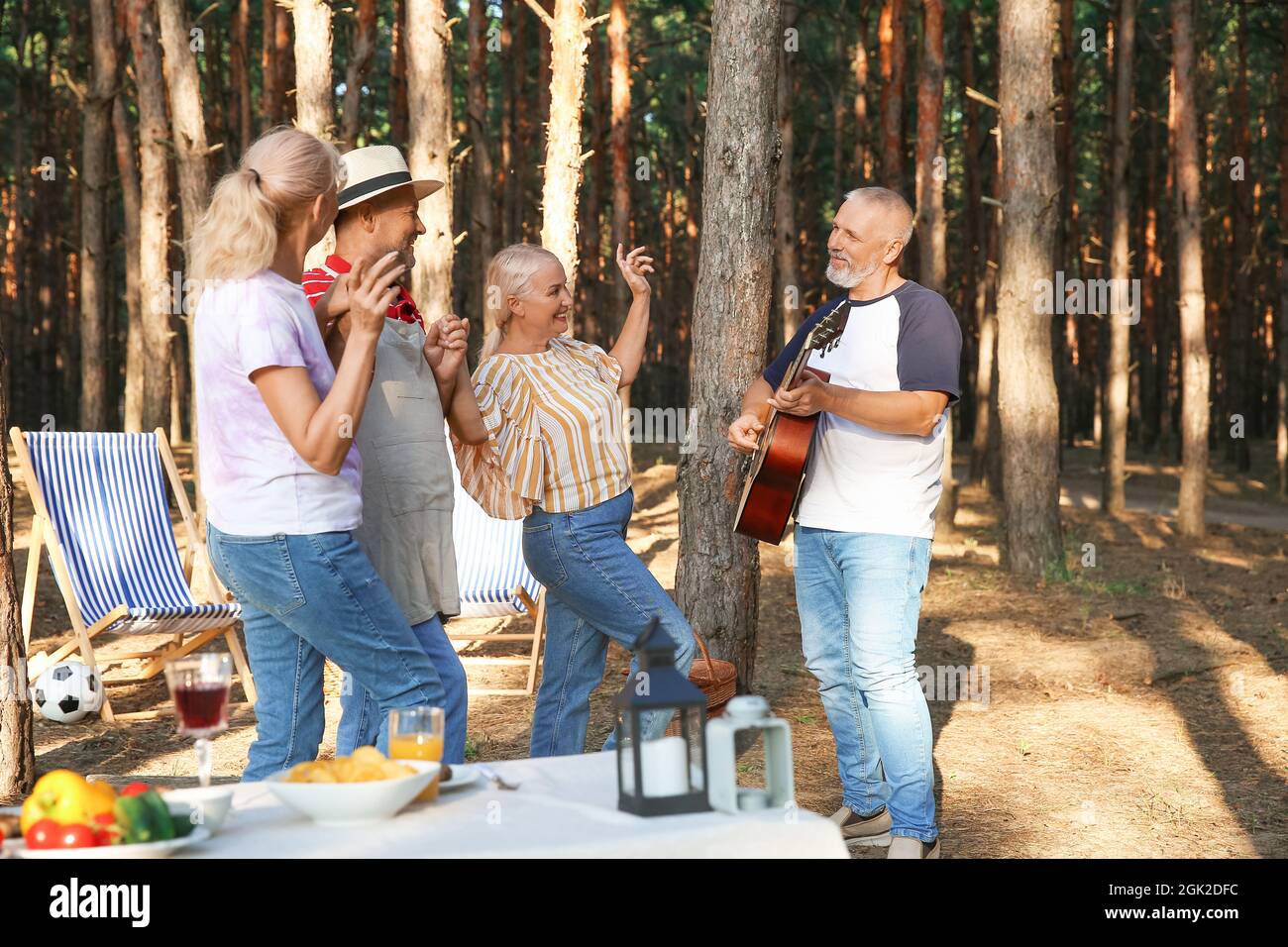 Mature people dancing at barbecue party on summer day Stock Photo - Alamy