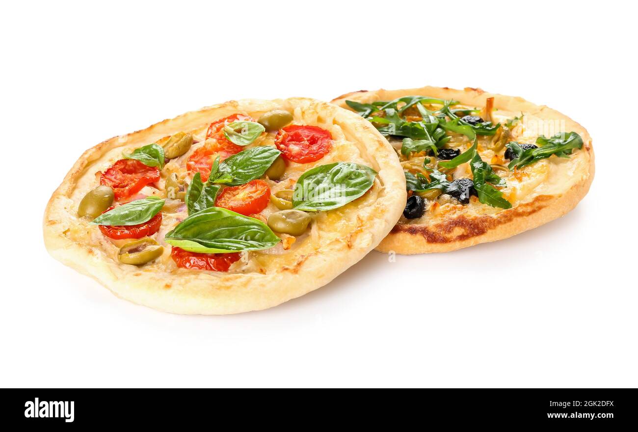 Tasty mini pizzas on white background Stock Photo - Alamy
