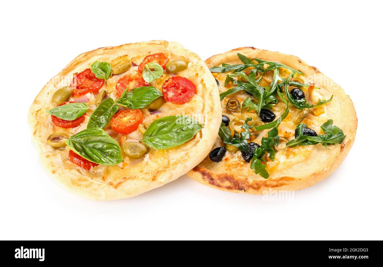Tasty mini pizzas on white background Stock Photo - Alamy