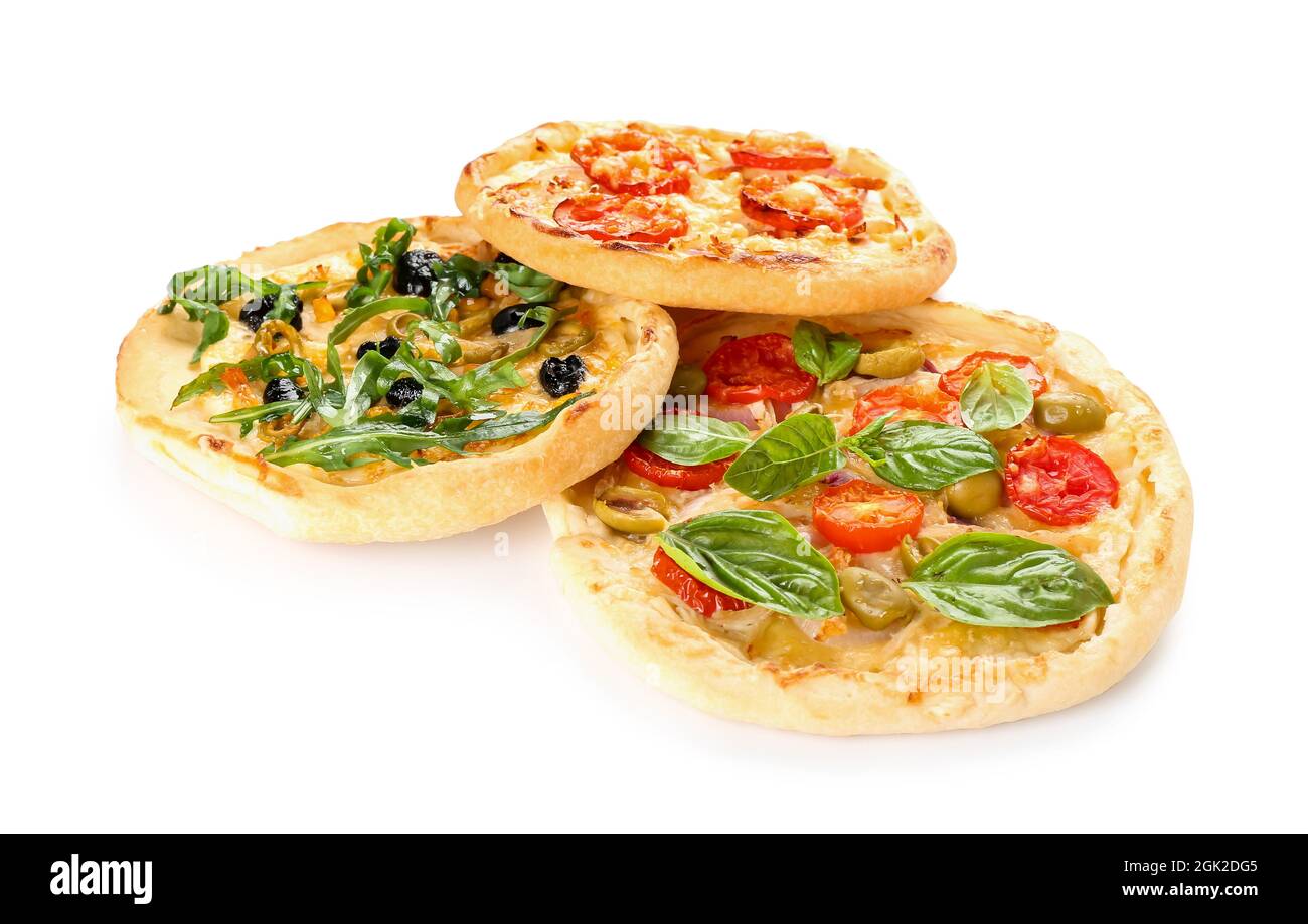 Tasty mini pizzas on white background Stock Photo - Alamy