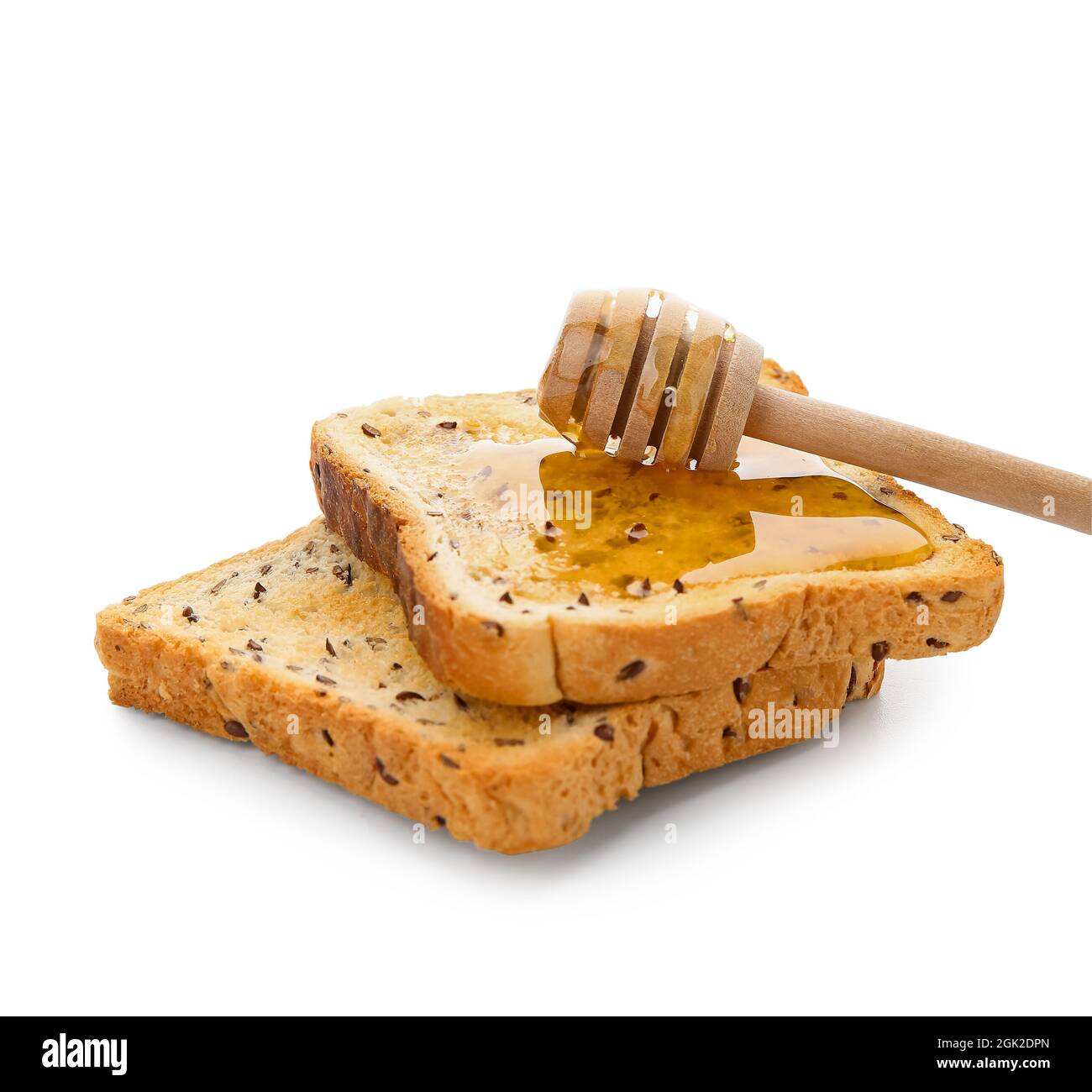 Tasty toasted bread with honey on white background Stock Photo - Alamy