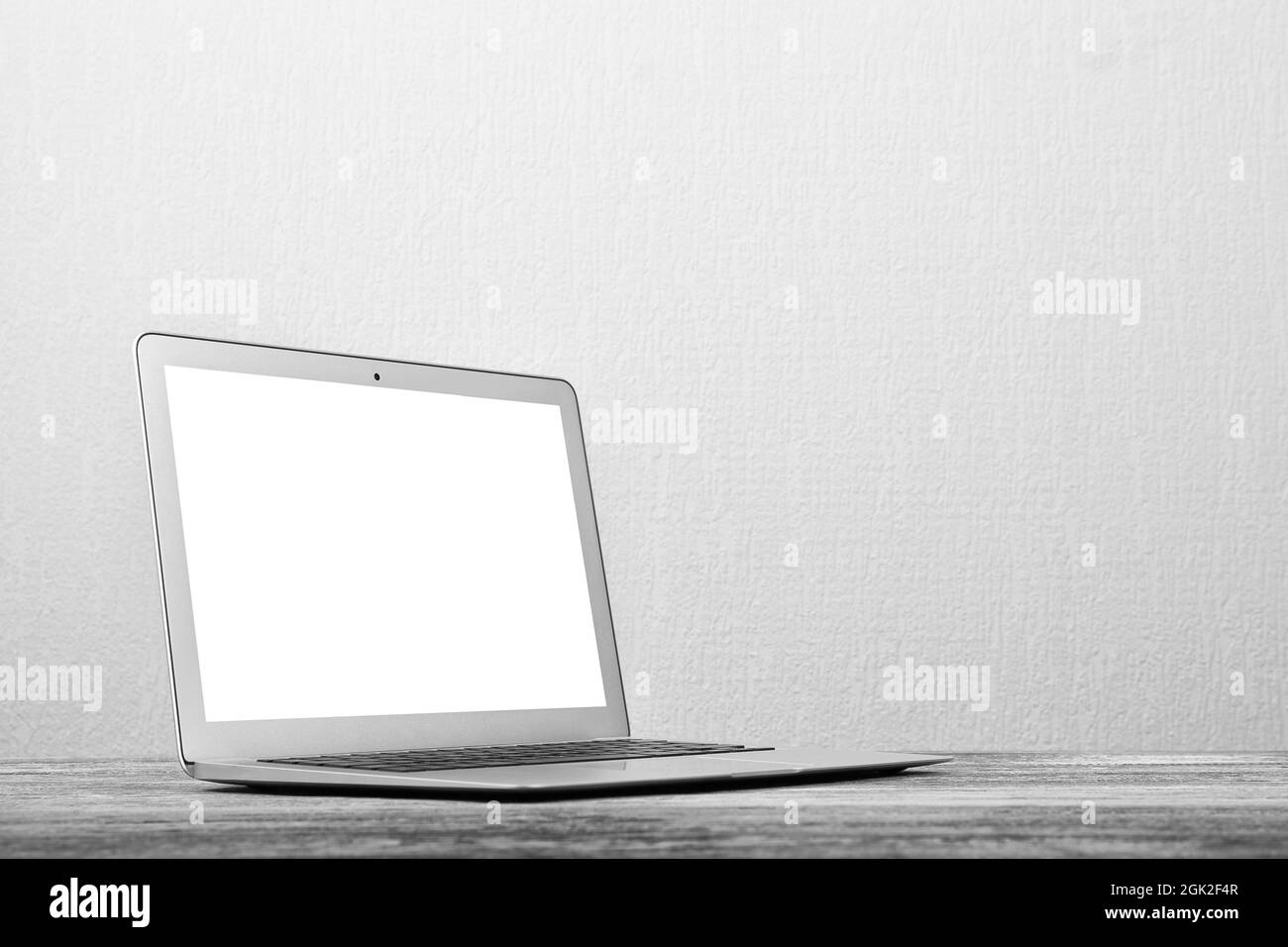 Modern laptop on light background Stock Photo - Alamy
