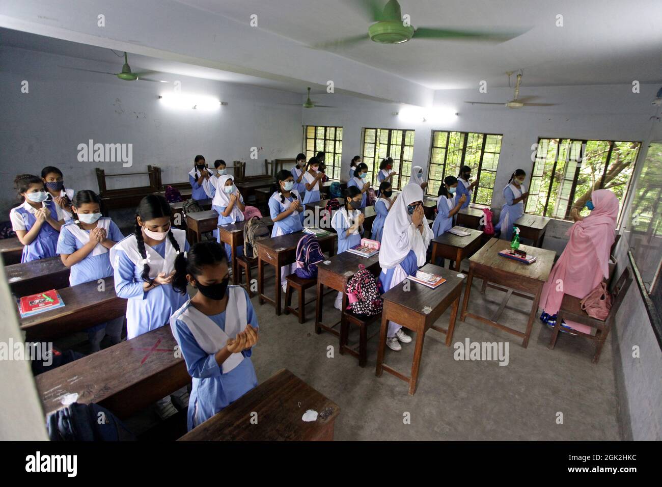 Non Exclusive: A student snap your fist with their classmate during the ...