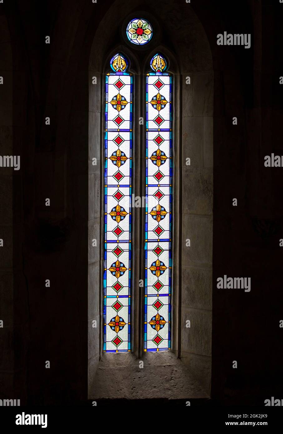 HUNEDOARA, ROMANIA - Aug 06, 2021: The stained glass at the windows of ...