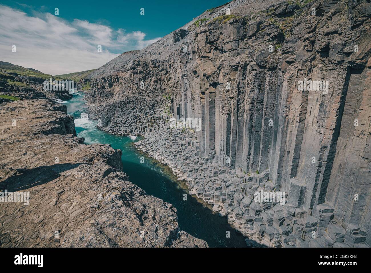 Amazing Studlagil canyon with high basalt columns in Iceland on a ...