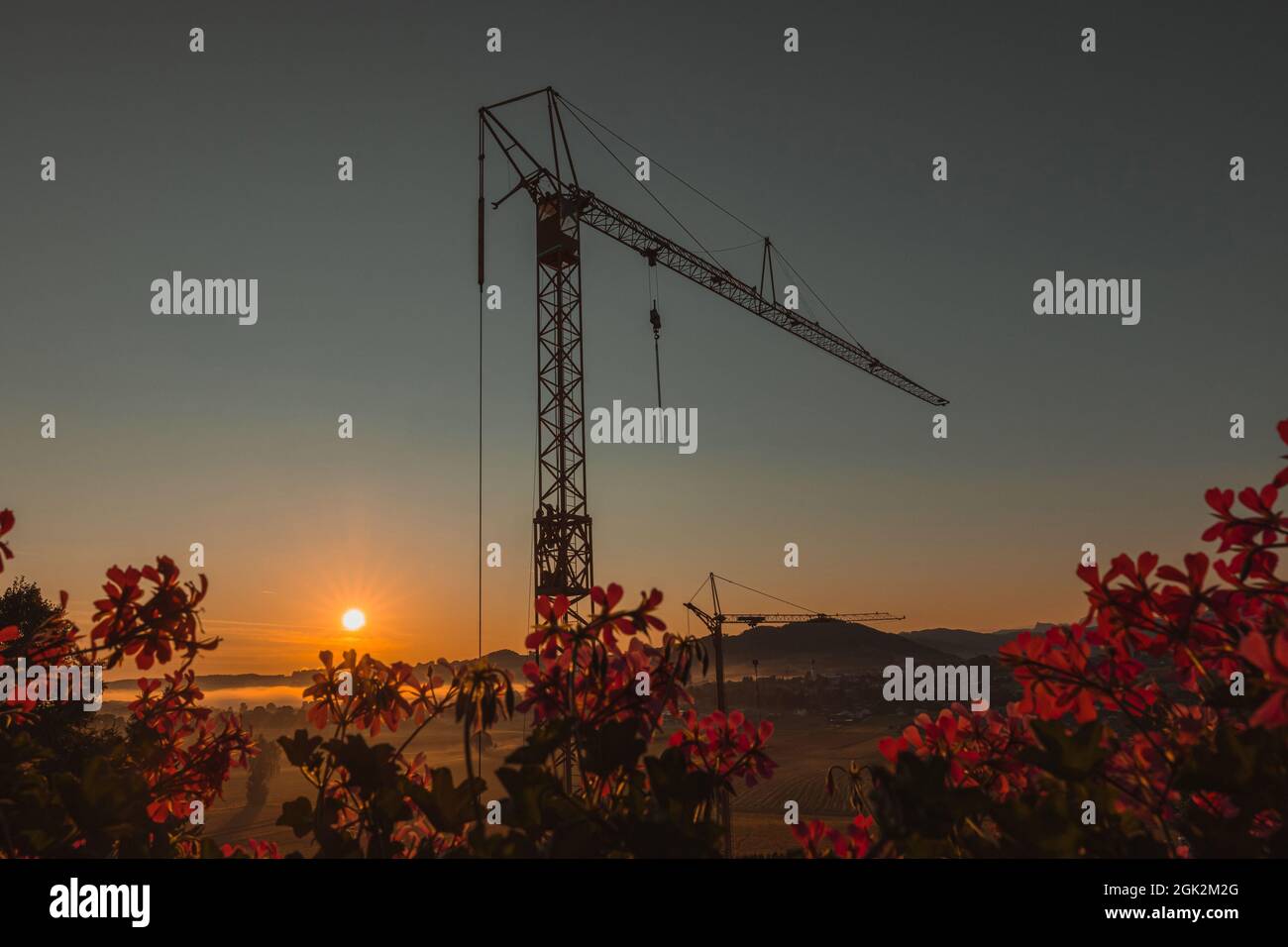 Construction site of an apartment building in early morning with ...