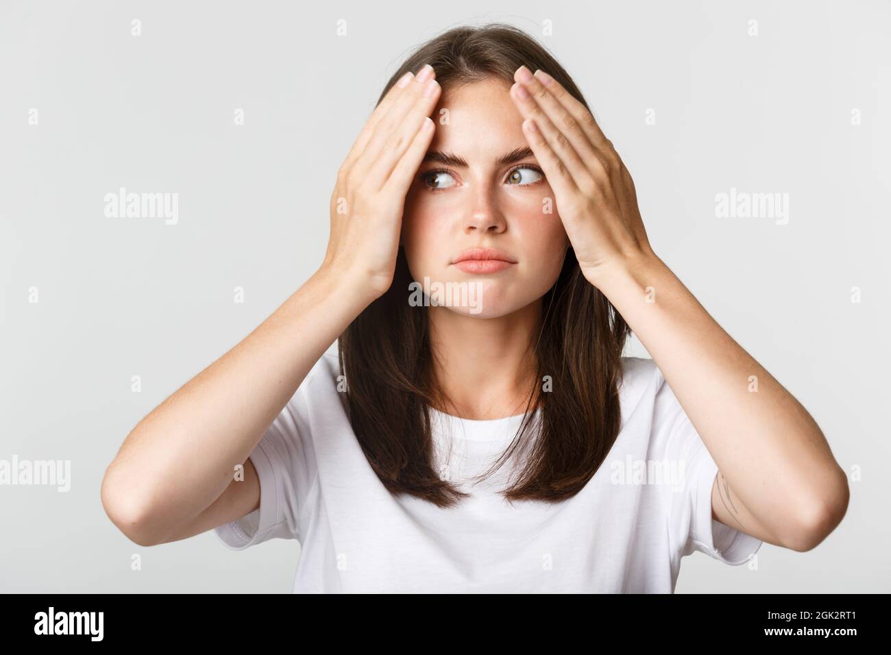 Close-up of embarrassed and shocked young beautiful woman facepalm and ...