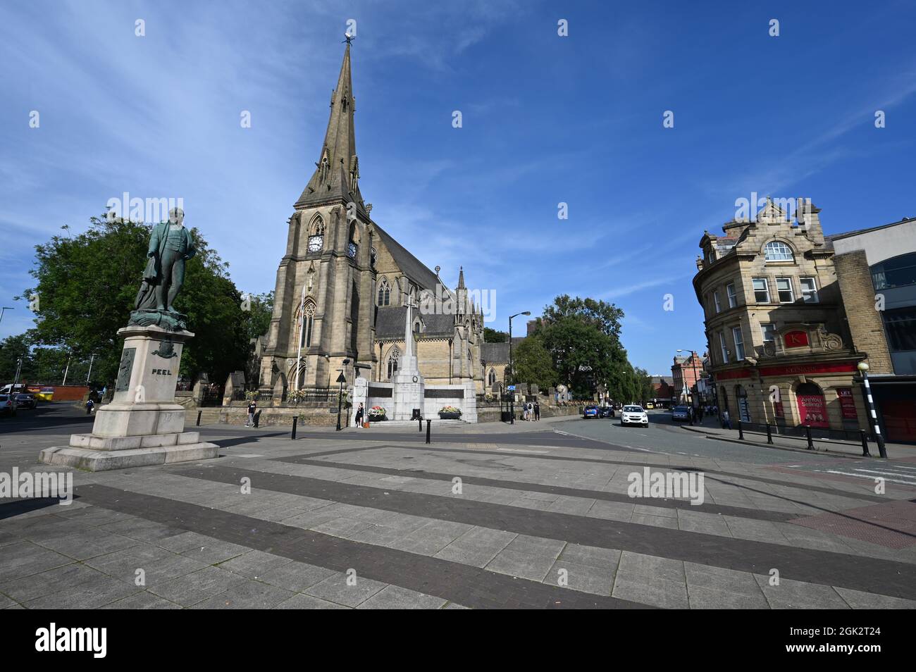 Church, statue and war memorial in Bury town center Stock Photo - Alamy
