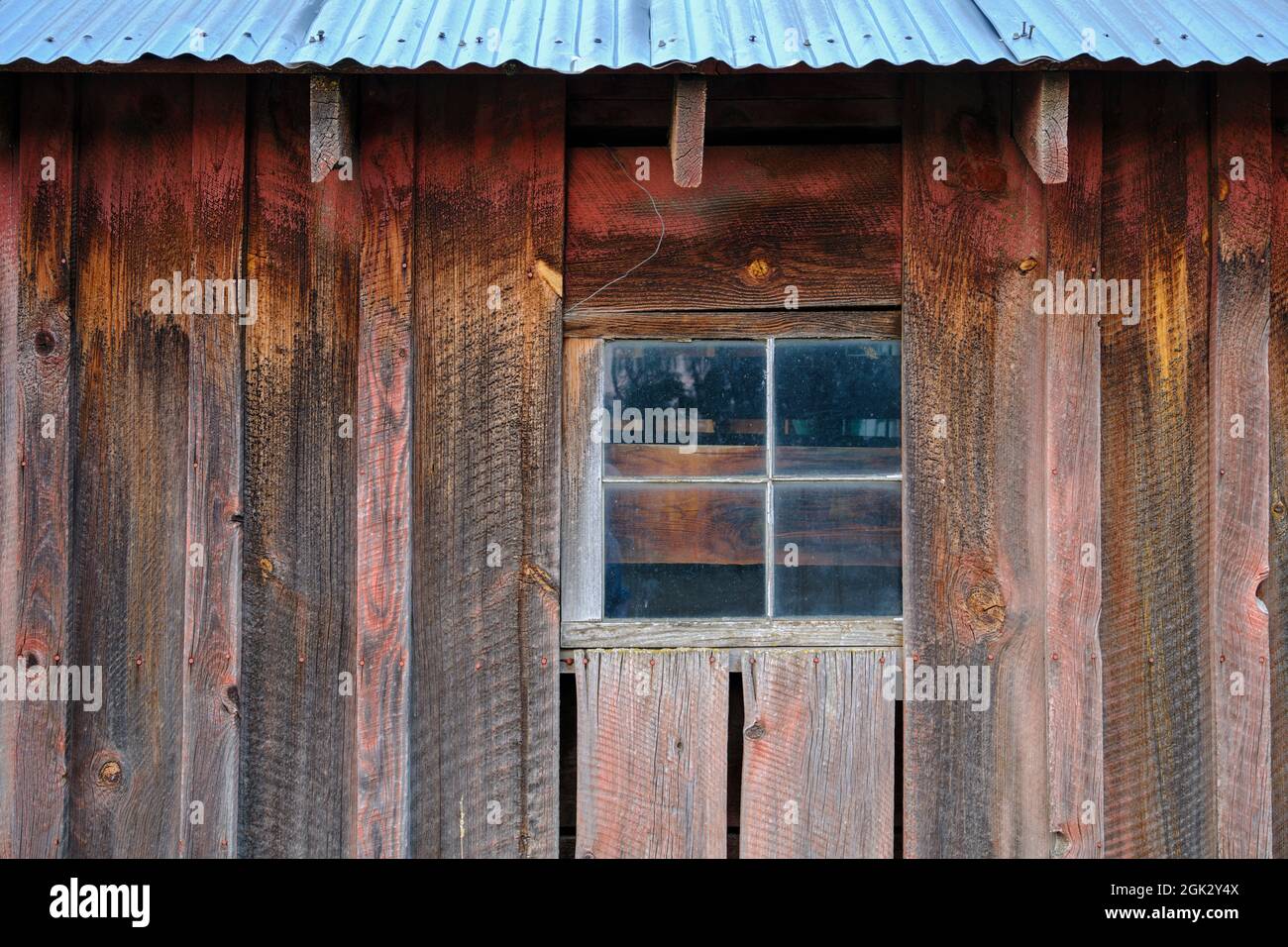 A window on the side of an old barn Stock Photo - Alamy