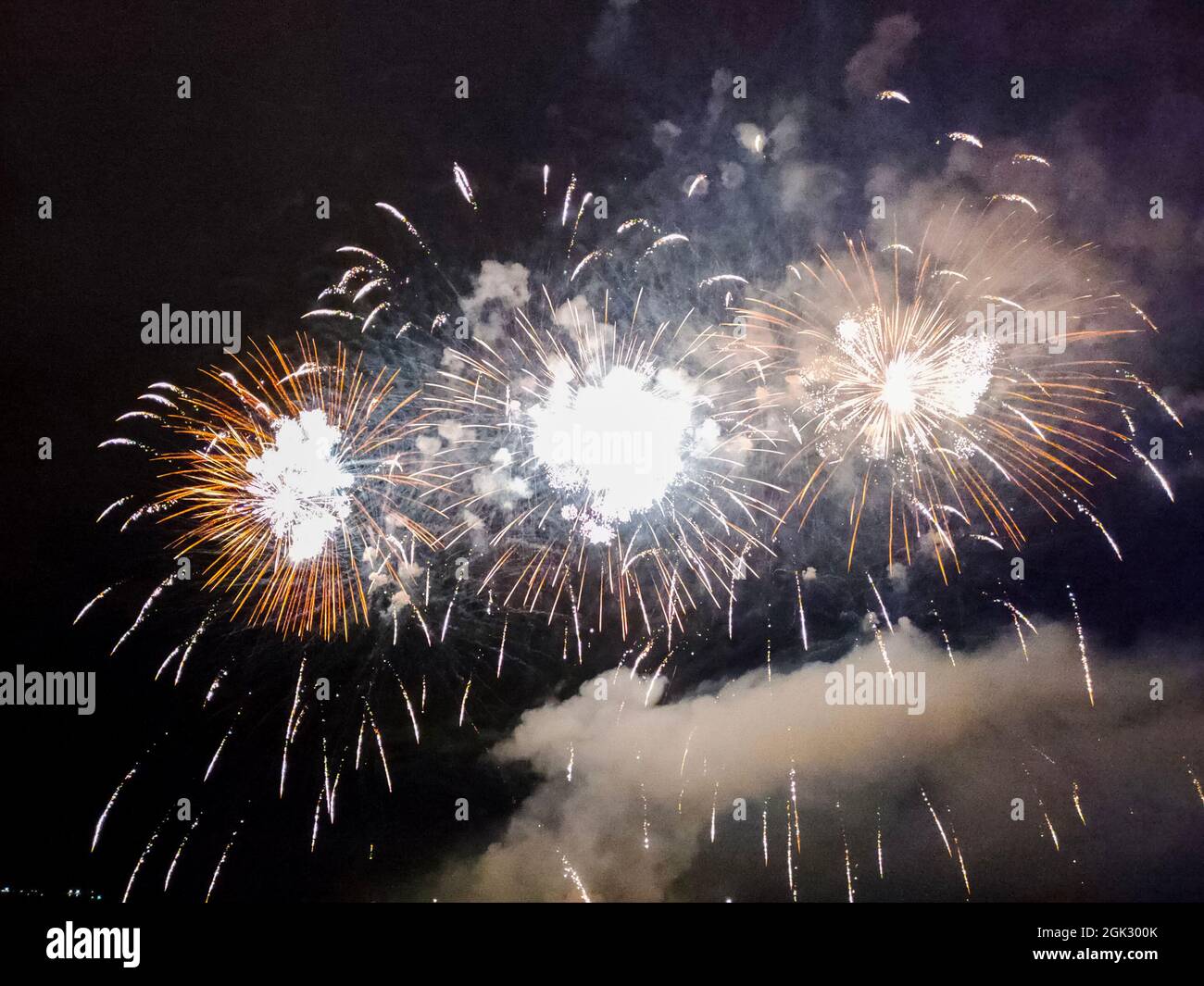 Festive firework in the sky at night - holiday celebration Stock Photo ...