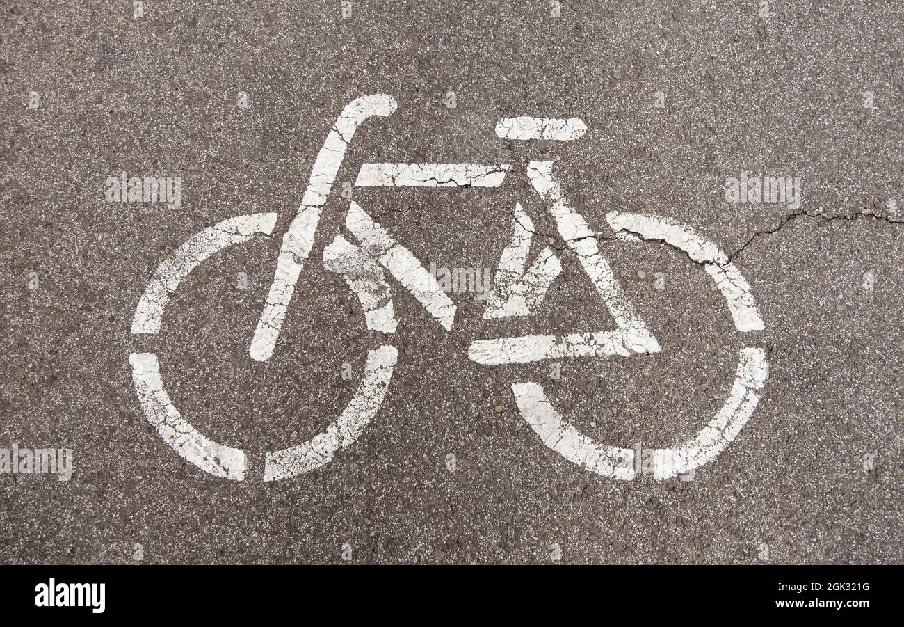 Detail of sign for cyclists on the road, bike lane Stock Photo - Alamy