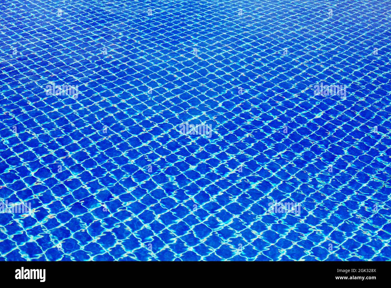 Swimming pool surface texture close up top view, blue water background ...